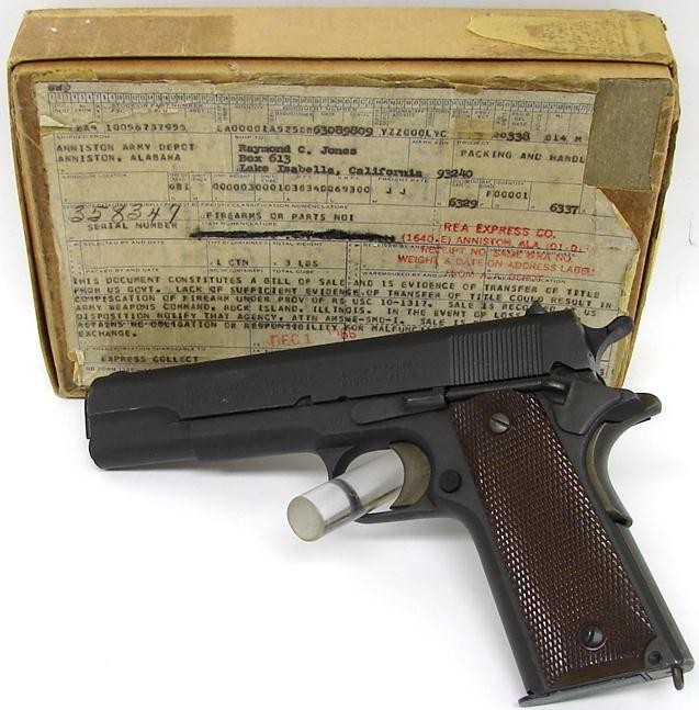 Colt 1911 .45 ACP caliber pistol. Augusta Arsenal rework for WWII with ...