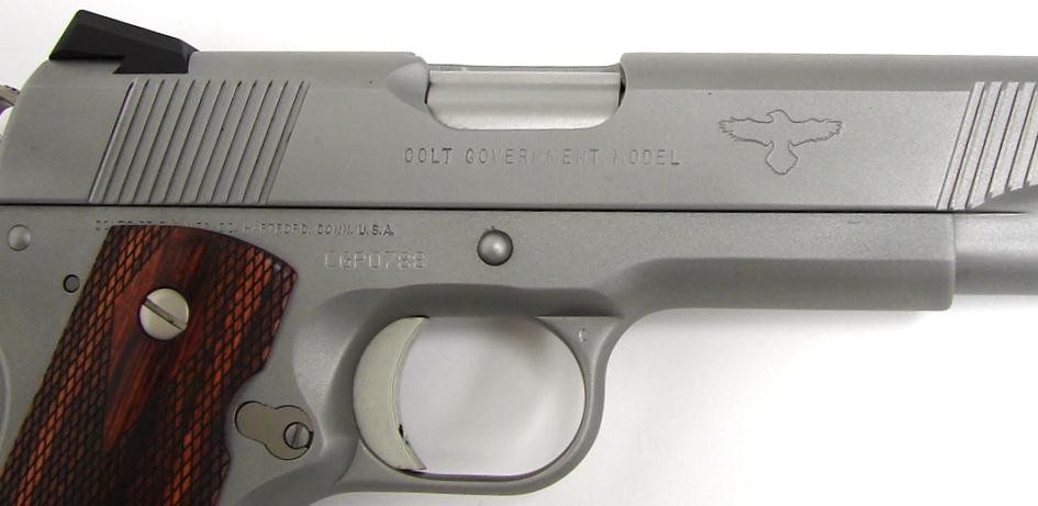 Colt Government Model .45 ACP caliber pistol. Gunsite stainless custom ...
