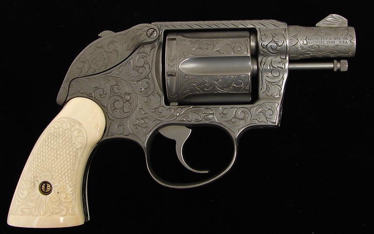 Colt Cobra .38 Special caliber revolver. Fancy little custom engraved ...