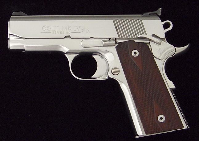 Colt Officers .45 ACP caliber pistol. Bright stainless steel compact ...