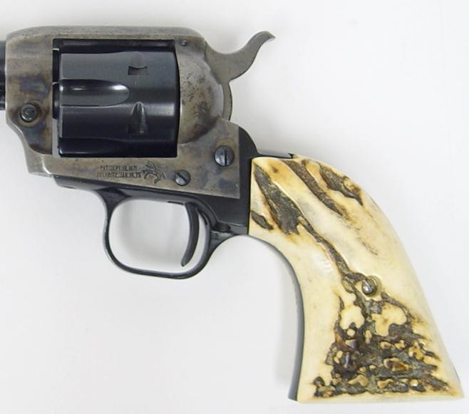Colt Peacemaker .22 LR caliber revolver. 7 ½ model with custom stag ...