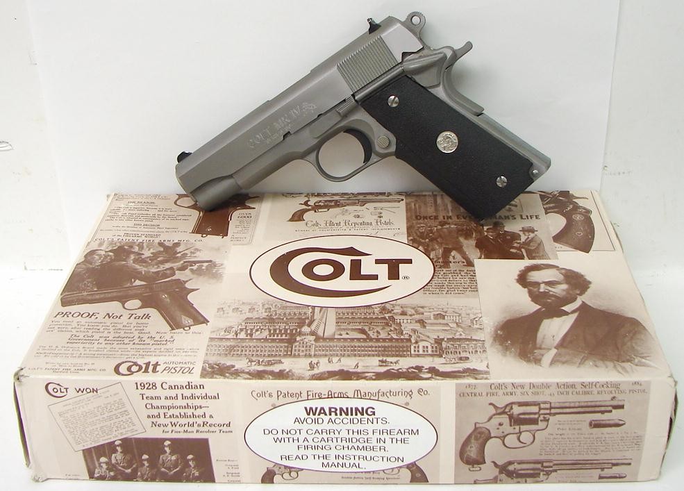 Colt Combat Commander .45 ACP caliber pistol. Early stainless steel ...