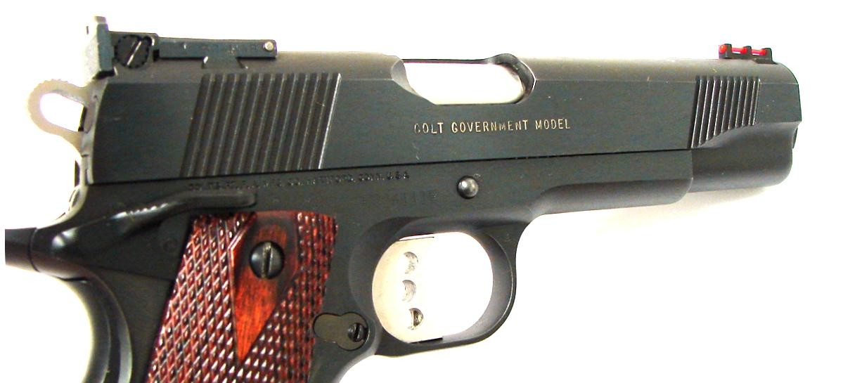 Colt Government .45 ACP caliber pistol. Customized XSE model with Bo ...