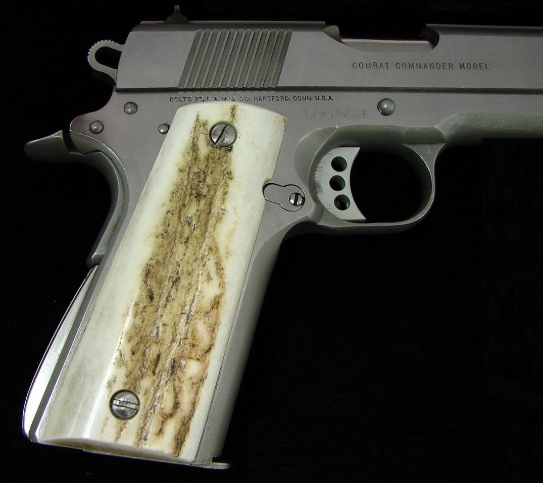 Colt Combat Commander .45 ACP caliber pistol. Stainless steel model ...