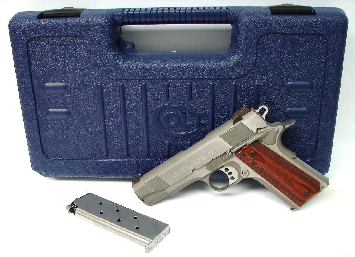 Colt Combat Commander .45 ACP caliber pistol. Stainless steel 4 1/4 ...