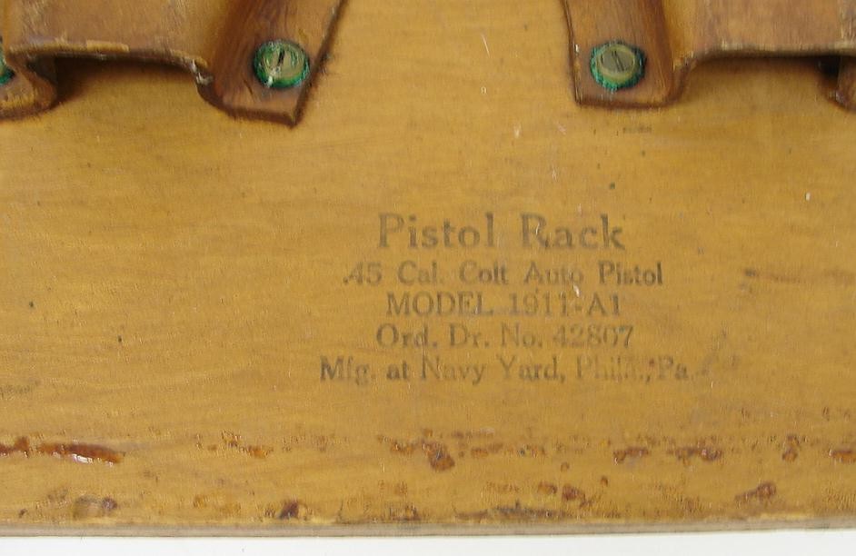 U.S. Navy Pistol Rack for shipboard use. Holds 6 Colt 1911 or 1911A1 ...