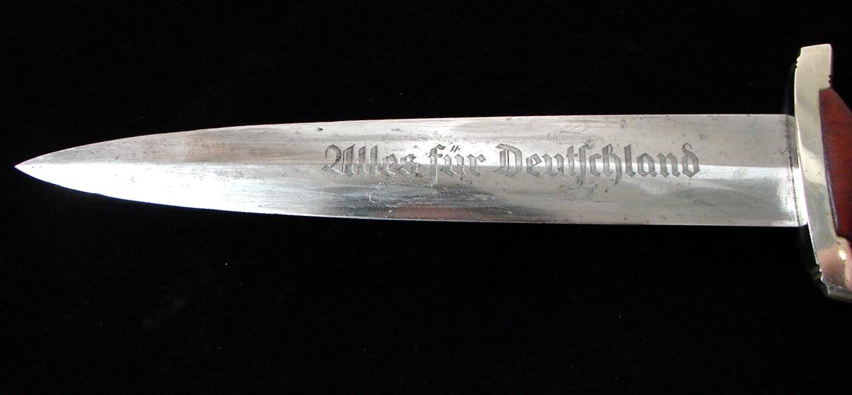 German SA Dagger by R. Haastert and Bull. Blade has some fine scratches ...