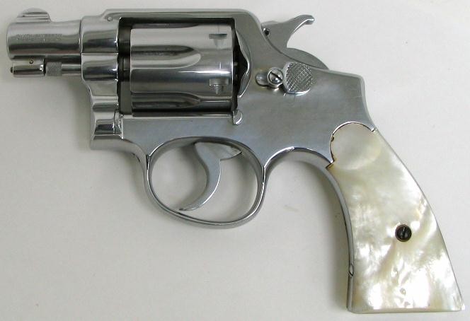 Smith & Wesson Military & Police .38 Special revolver with pearl grips ...