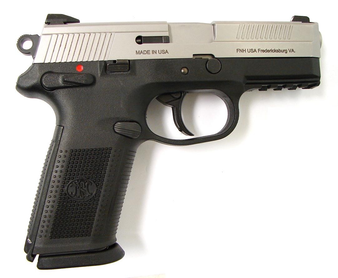 FNH FNX-40 .40 S&W caliber pistol. Stainless model in excellent ...