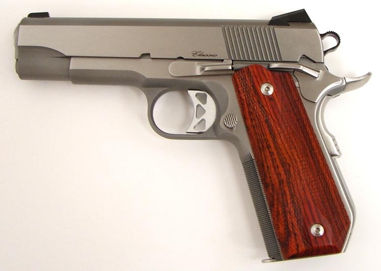 Dan Wesson Commander CLSC BTL 10MM caliber pistol. This is a stainless ...