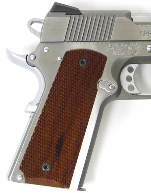 Springfield 1911 A1 9mm caliber pistol. This is a full size model with ...