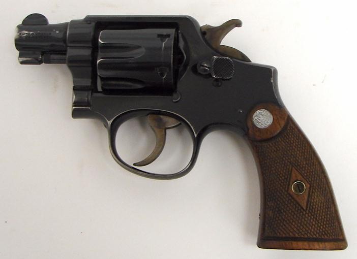 Smith & Wesson M&P .38 special caliber revolver. This is a rare pre-war ...