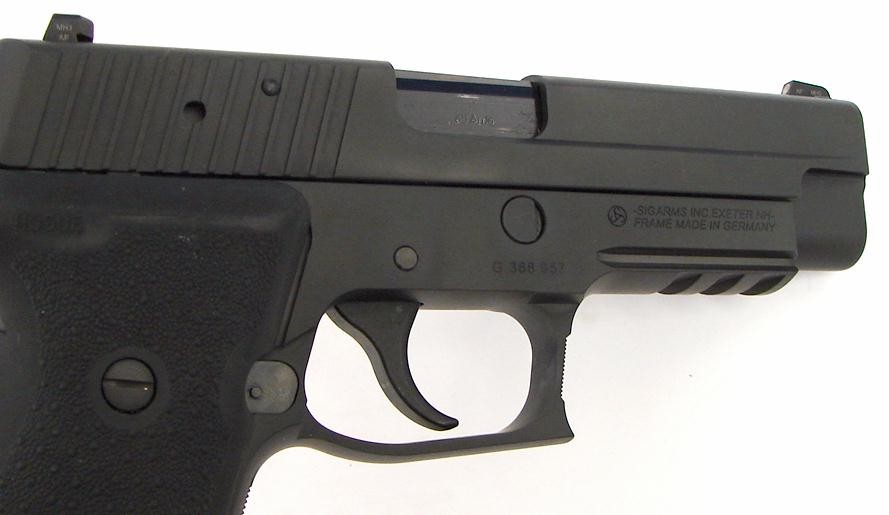 Sig Sauer P220 .45 ACP caliber pistol. This is a rare all stainless ...