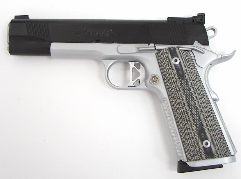 Nighthawk Custom Dominator .45 ACP caliber pistol. Two-tone model with ...