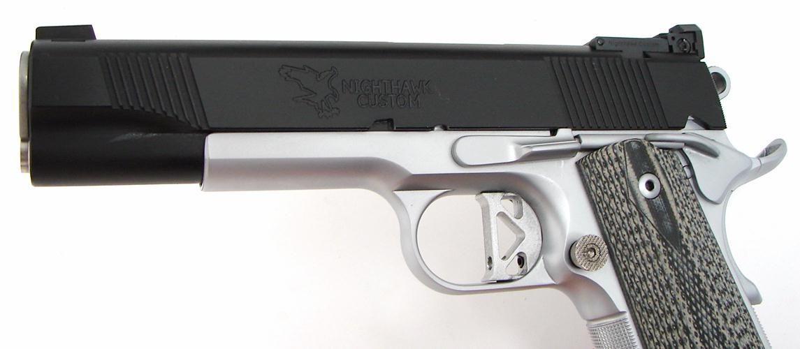 Nighthawk Custom Dominator .45 ACP caliber pistol. Two-tone model with ...