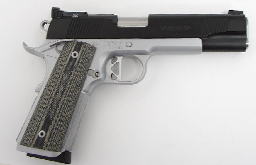 Nighthawk Custom Dominator .45 ACP caliber pistol. Two-tone model with ...