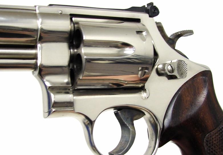 Smith & Wesson 29-2 .44 Magnum caliber revolver. Factory nickel pistol with pinned barrel ...