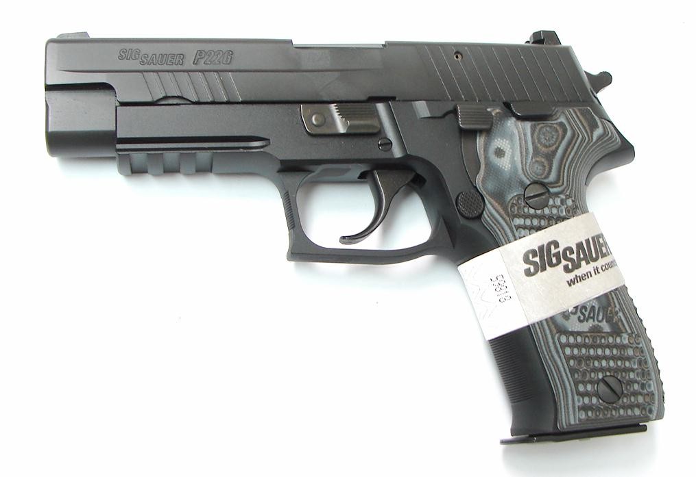 Sig Sauer P226 Extreme 9 MM Para caliber pistol. With night sights ...