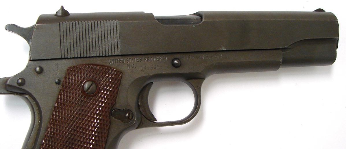 Remington Rand 1911 A1 .45 ACP caliber pistol. Manufactured approximately 1943. Bore is ...