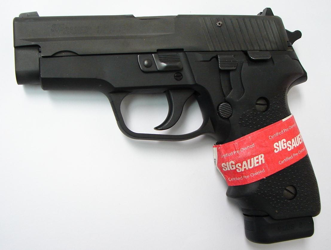 Sig Sauer P228 9MM PARA caliber pistol. Popular compact model, factory ...