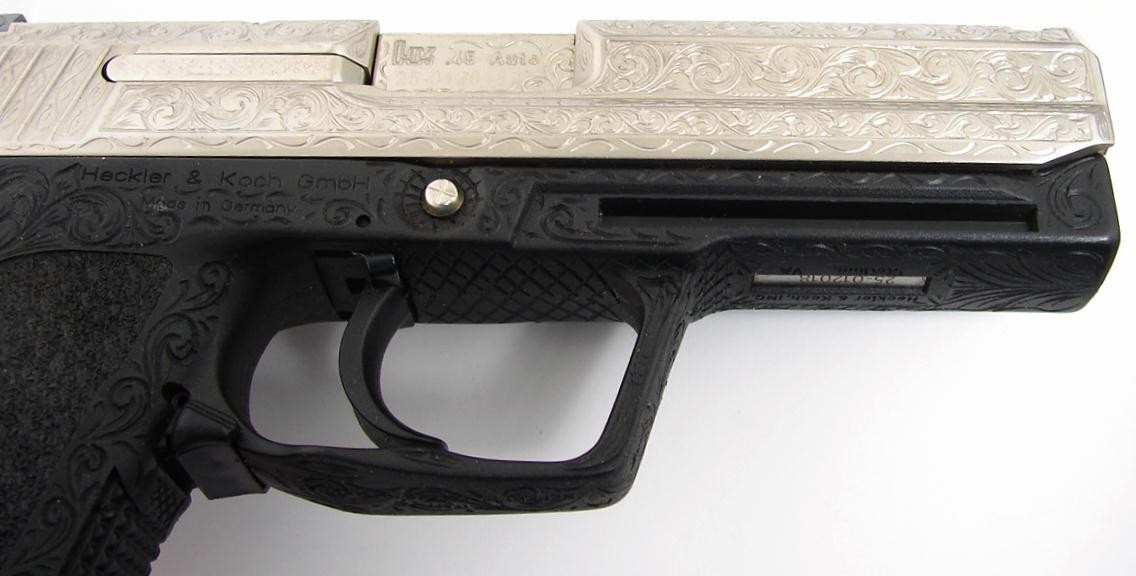 Heckler & Koch USP .45 ACP caliber pistol. Beautiful custom engraved ...