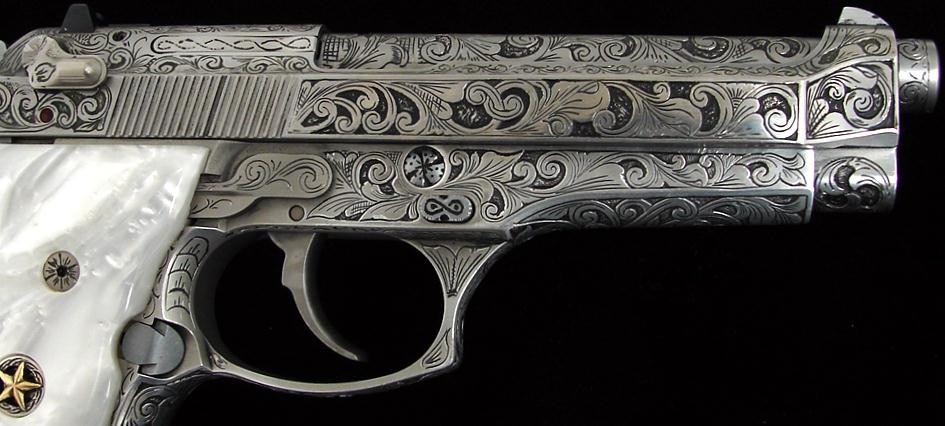 Beretta 92FS 9mm Para caliber pistol. Custom engraved stainless model ...