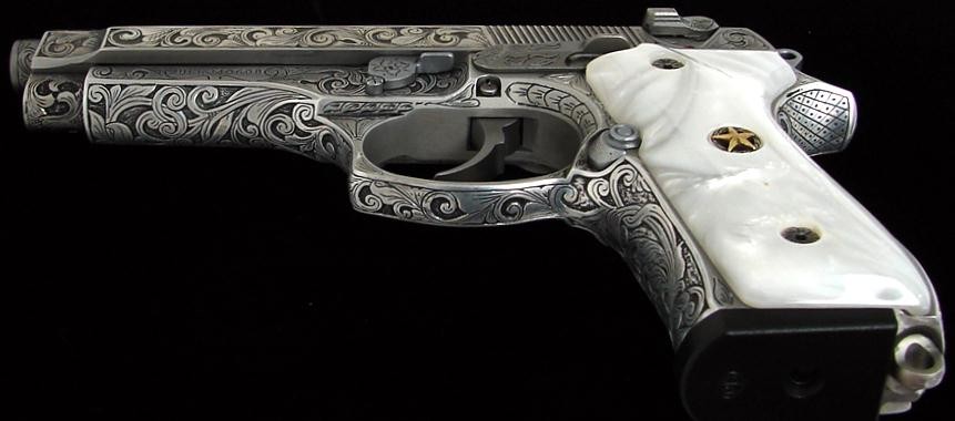 Beretta 92FS 9mm Para caliber pistol. Custom engraved stainless model ...