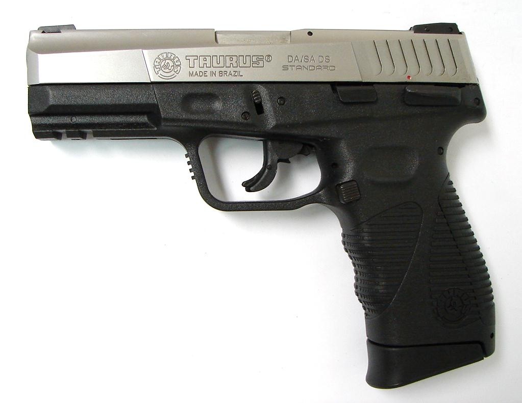 Taurus PT 24/7 G2 .40 S&W caliber pistol. Two tone model with fixed ...