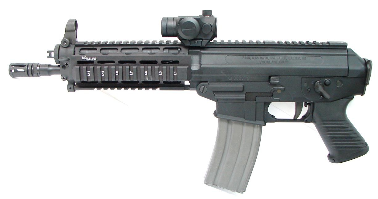 Sig Sauer P556 5.56 NATO caliber pistol. Quad rail and red dot sight ...